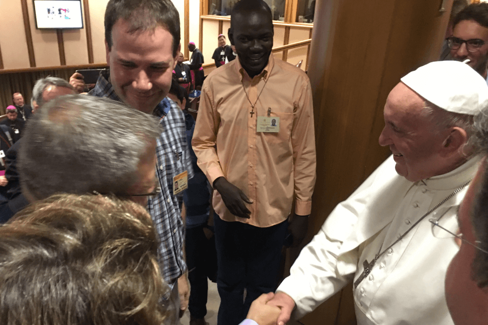 A smile and a handshake - Catholic Review