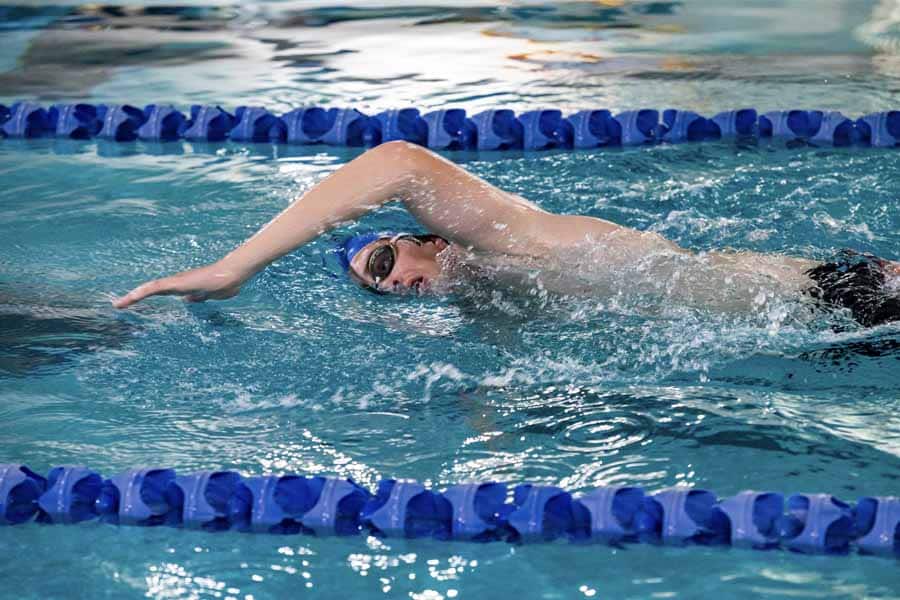 Swimming with a purpose: Curley student inspires athletes with physical ...