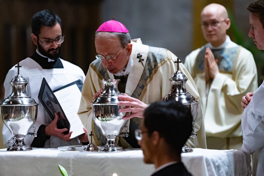 Archbishop Lori blesses holy oils at packed chrism Mass - Catholic Review