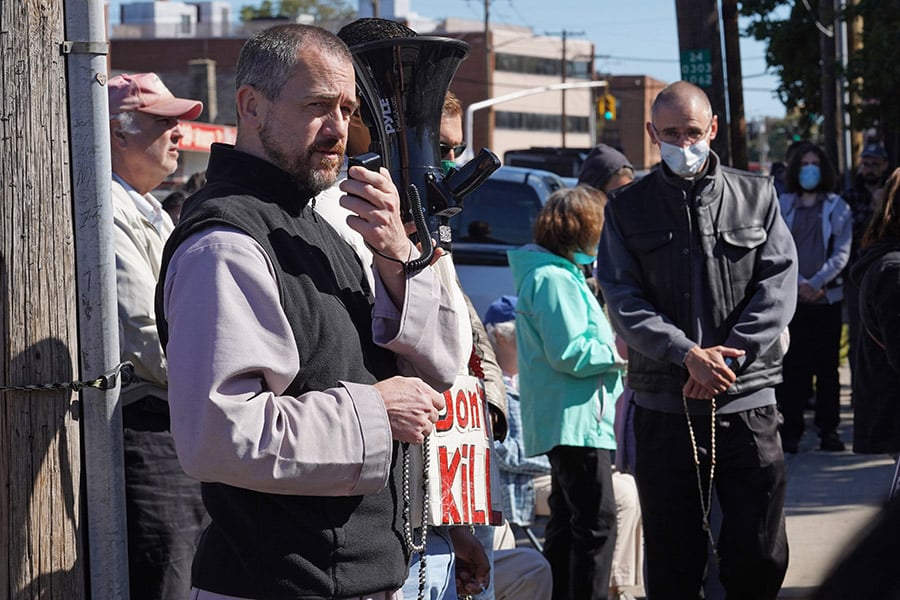Friar charged with blocking access to Long Island Planned Parenthood ...