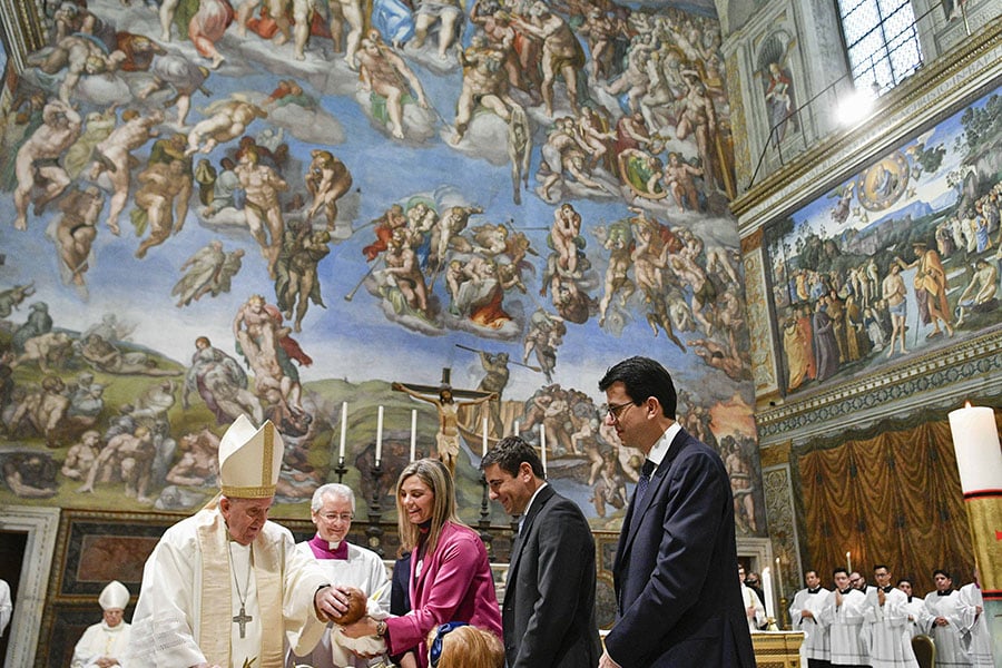 Pope baptizes babies, urges parents to teach them to pray - Catholic Review