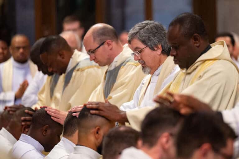 Historic day: Archbishop Lori ordains largest class of priests in more than 40 years - Catholic ...