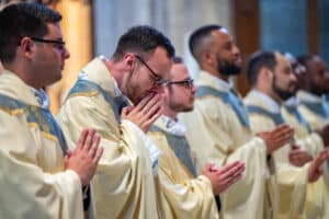 Historic day: Archbishop Lori ordains largest class of priests in more than 40 years - Catholic ...