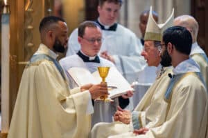 Historic day: Archbishop Lori ordains largest class of priests in more than 40 years - Catholic ...