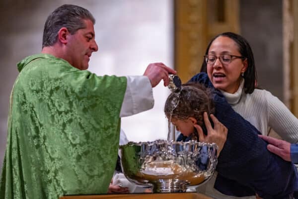 ‘Baptism in a day’ welcomes unbaptized children into the faith ...