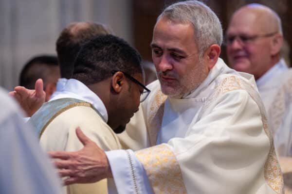 Archbishop Lori ordains six transitional and two permanent deacons in ...