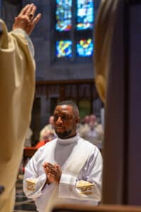Excitement and pride abound at ordination of five priests for Archdiocese of Baltimore ...