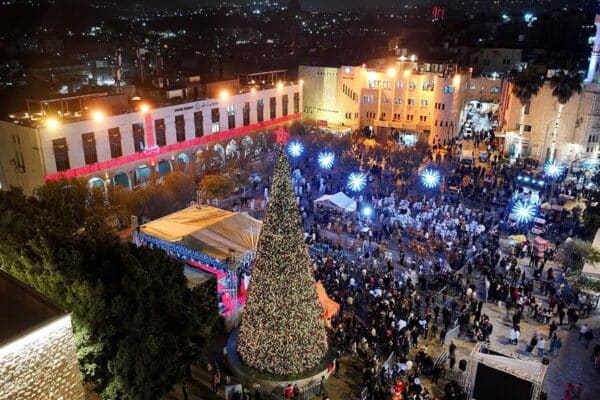 Bethlehem celebrates first Christmas tree lighting since war as ...