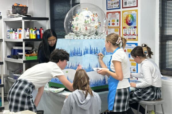 Local schools decorate snow globes for charity - Catholic Review
